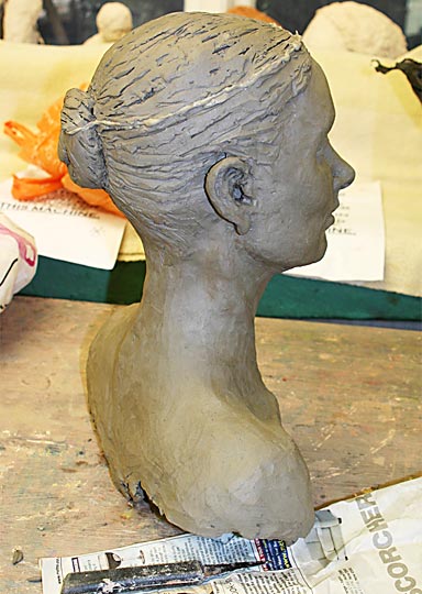 Hollowing out a clay head – Art by Jess Miller